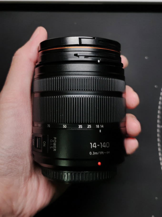 松下无反镜头怎么样 M43最小巧的大变焦头——松下14-140二代_什么值得买