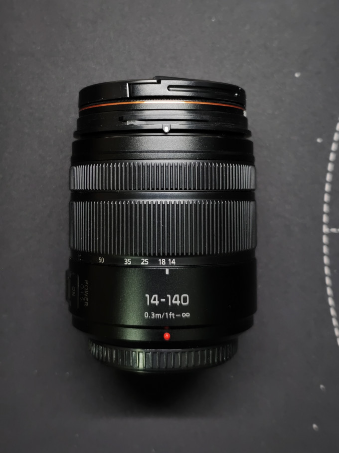 松下无反镜头怎么样 M43最小巧的大变焦头——松下14-140二代_什么值得买